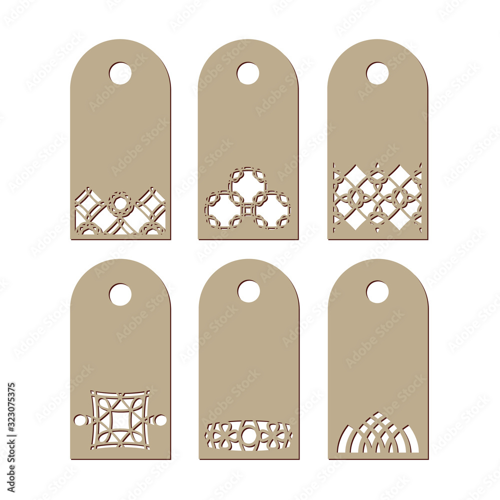 Set stencil labels with a carved openwork pattern on a white background ...