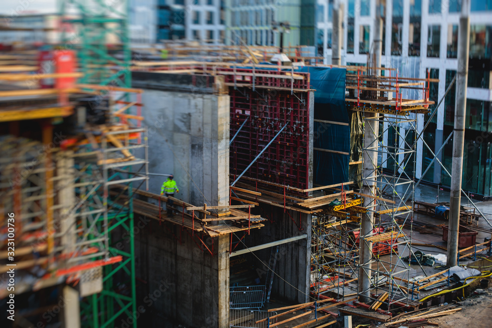 Process of apartment block construction, building site of multistoried ...