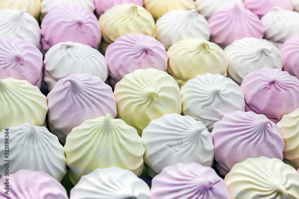 different colors of marshmallows. Marshmallow background in pastel ...