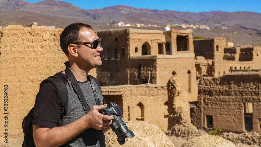 Caucasian Male Tourist Taking Photos of Abandoned Old Ruined Village of ...