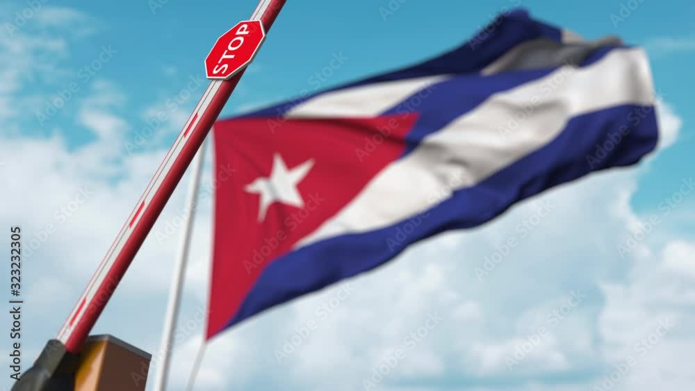 Opening boom barrier with stop sign against the Cuban flag. Free entry ...