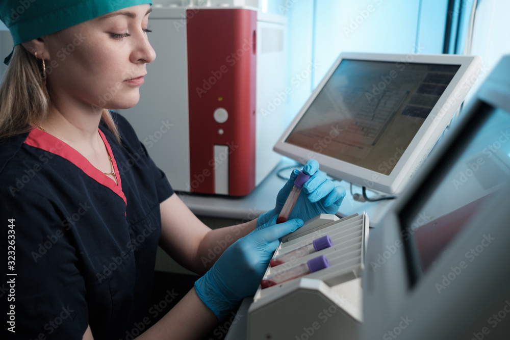 Female biologist holding bottle with new medication, vaccination lab ...