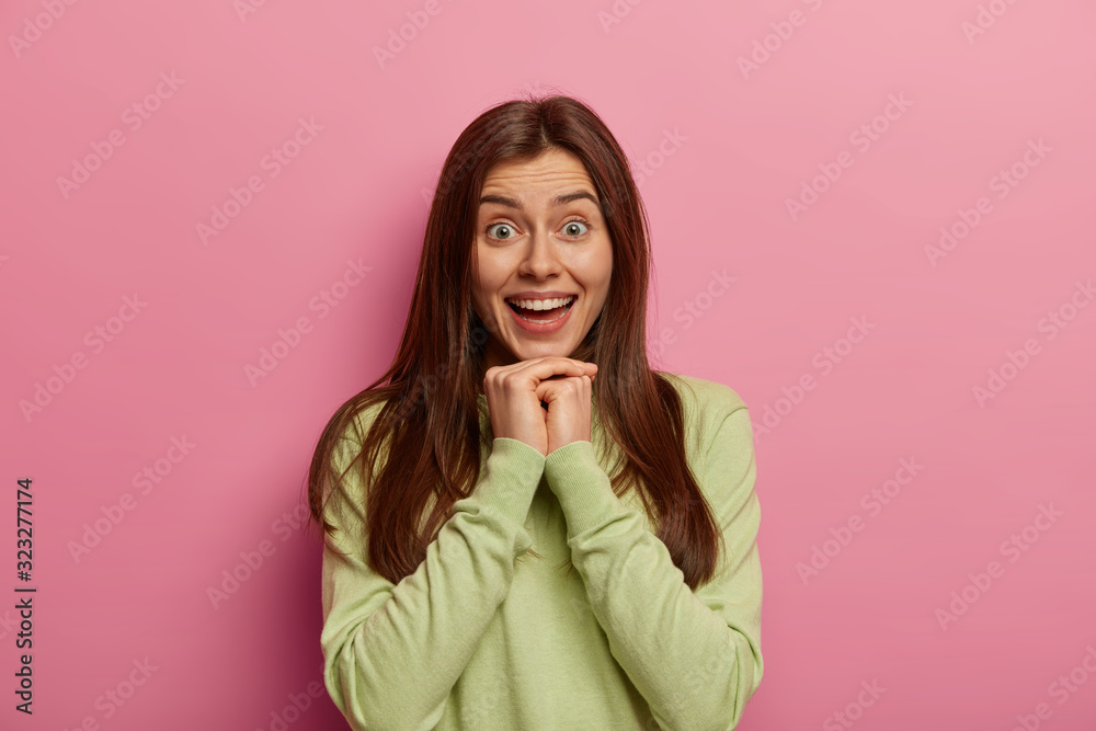 Isolated shot of beautiful positive girl with happy surprised ...