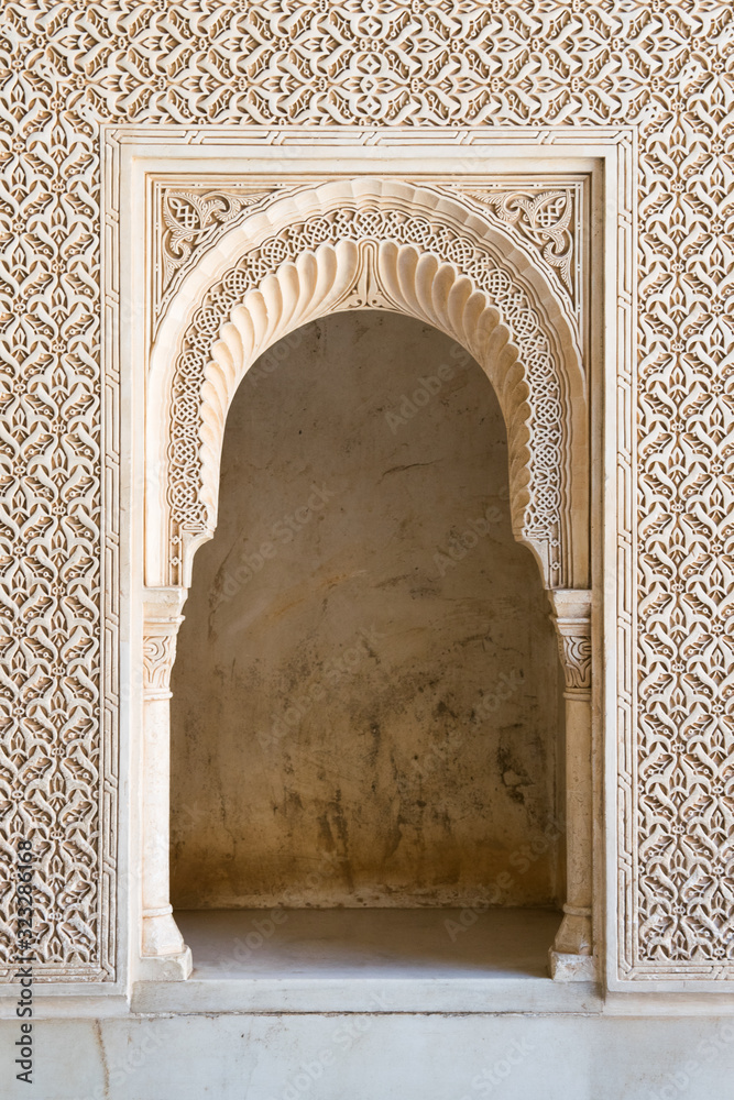 Arabic architectural details in columns and arches of a mosque or an ...