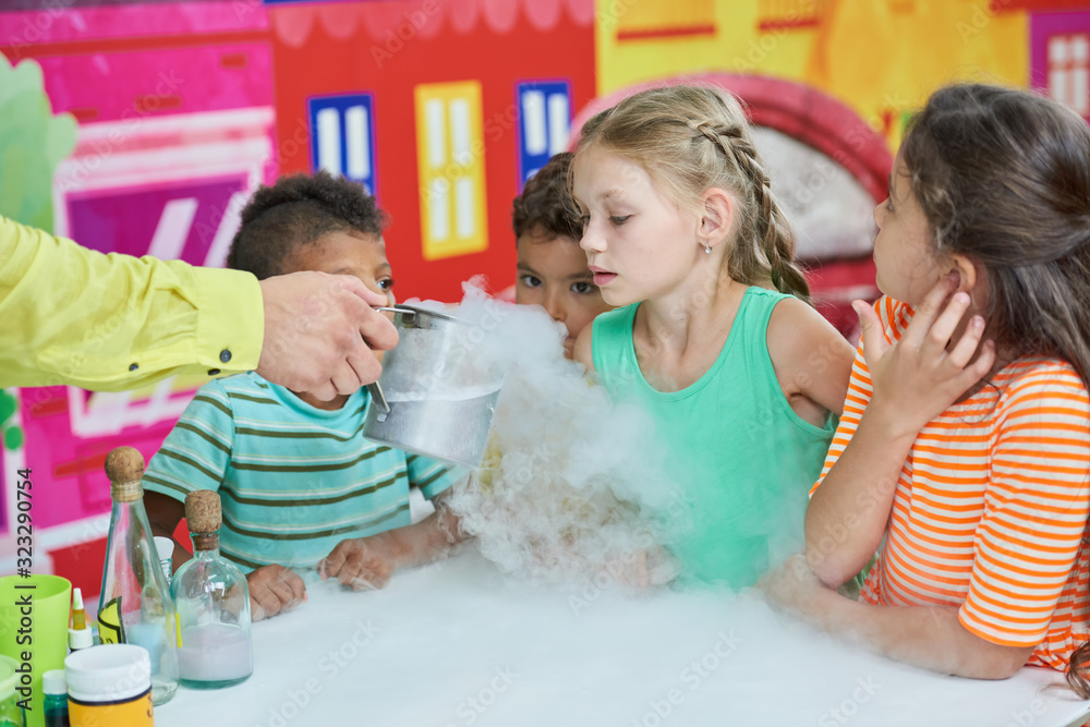 Happy kids having fun in entertainment center. Happy emotional kids ...