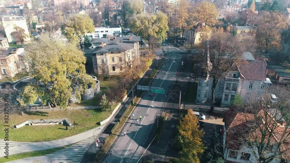 Starting line of the street marathon in the centre of an old city, Jelenia Góra, between the ...