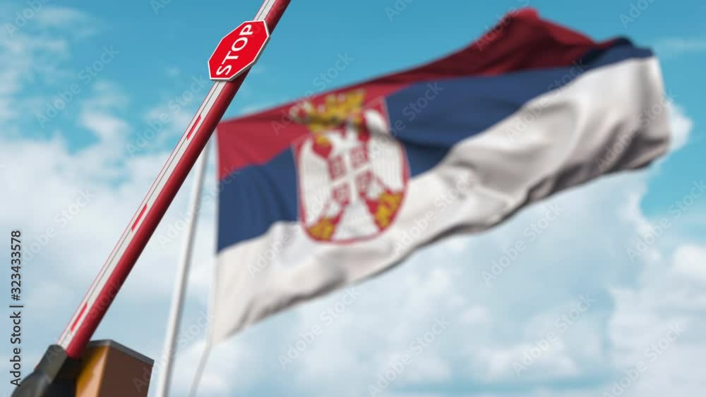 Opening boom barrier with stop sign against the Serbian flag. Free ...
