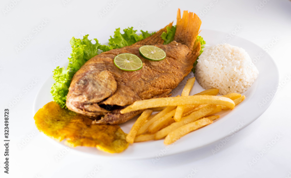Fried mojarra colombian typical dish fish Stock Photo | Adobe Stock