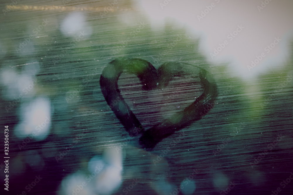 Conceptual photo of a heart shape in the window to show concept of ...