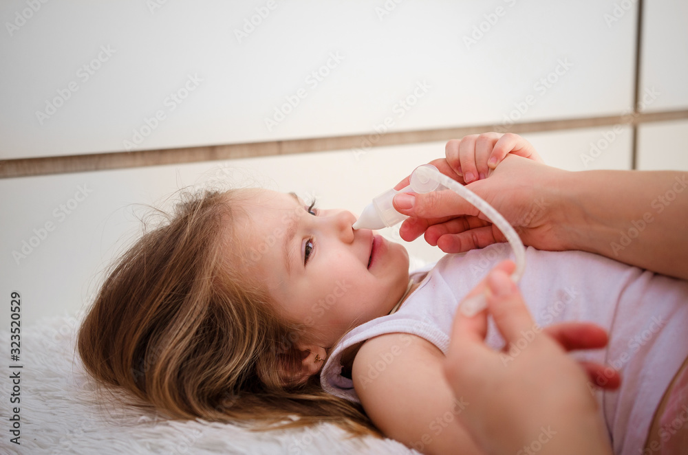 Mother using "Nose cleaner vacuum suction nasal mucus runny aspirator ...