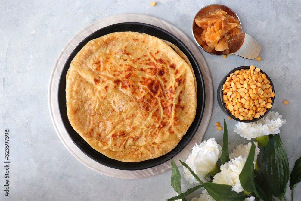 Holi Festival Food - Puran Poli is an Indian sweet flatbread stuffed ...