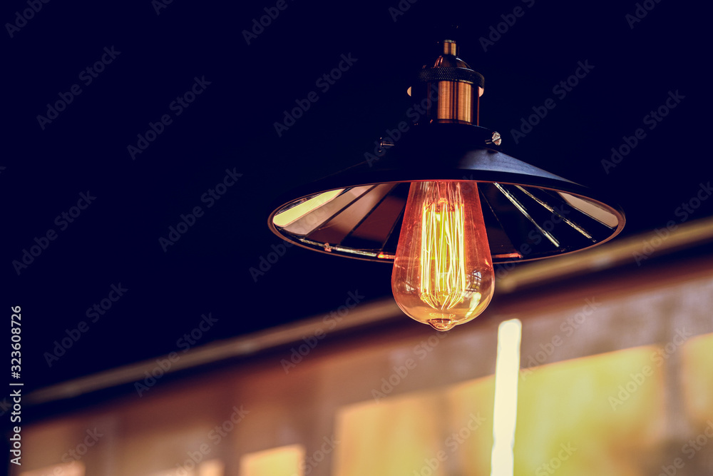 Vintage style pendant light to show the concept of the roaring 20s or ...