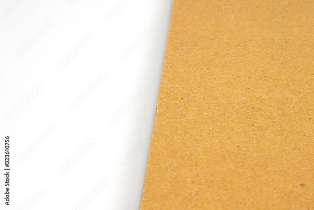 Blank cardboard hardcover on white paper background with free space as ...