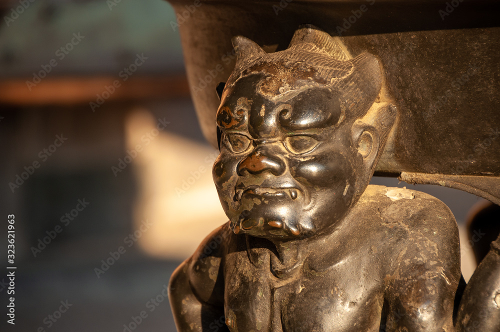 statue of devil in a Japanese temple Stock Photo | Adobe Stock