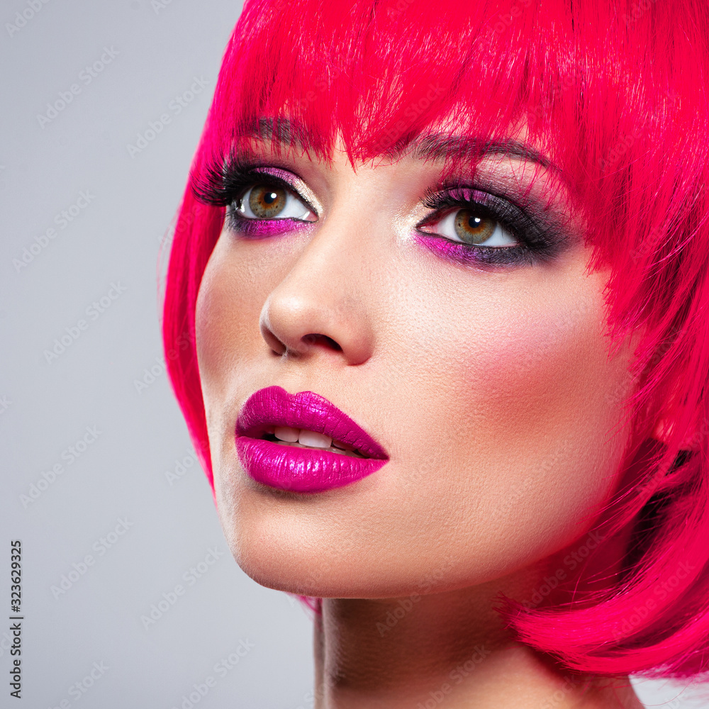 Caucasian fashion model with bob hairstyle colored in pink. Female Eyes ...