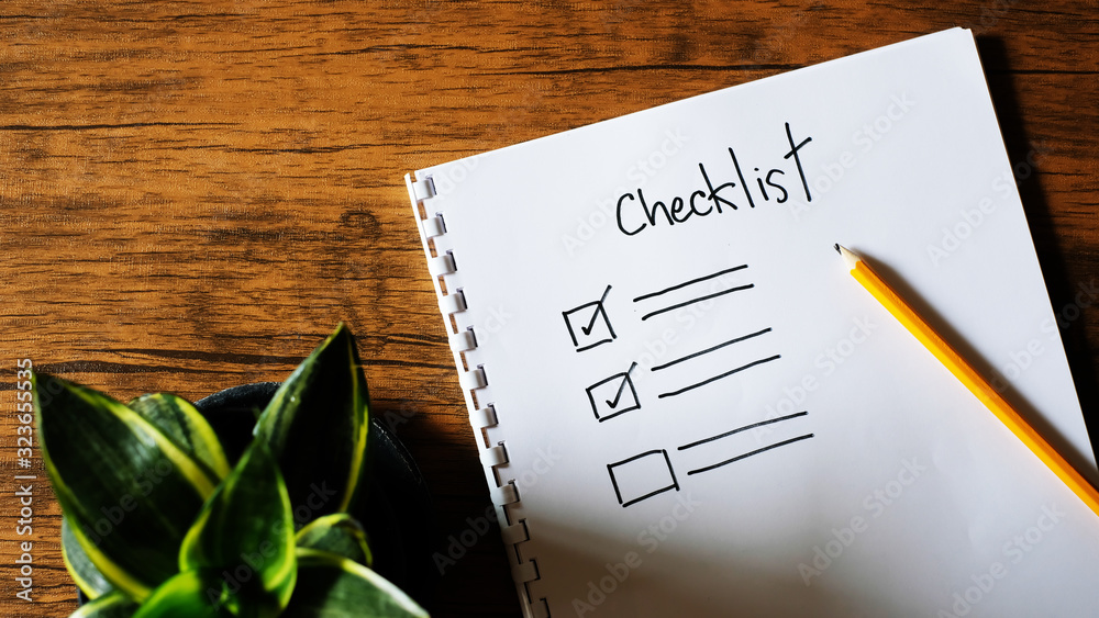 Checklist box on paper with checkmark and pencil. Stock Photo | Adobe Stock