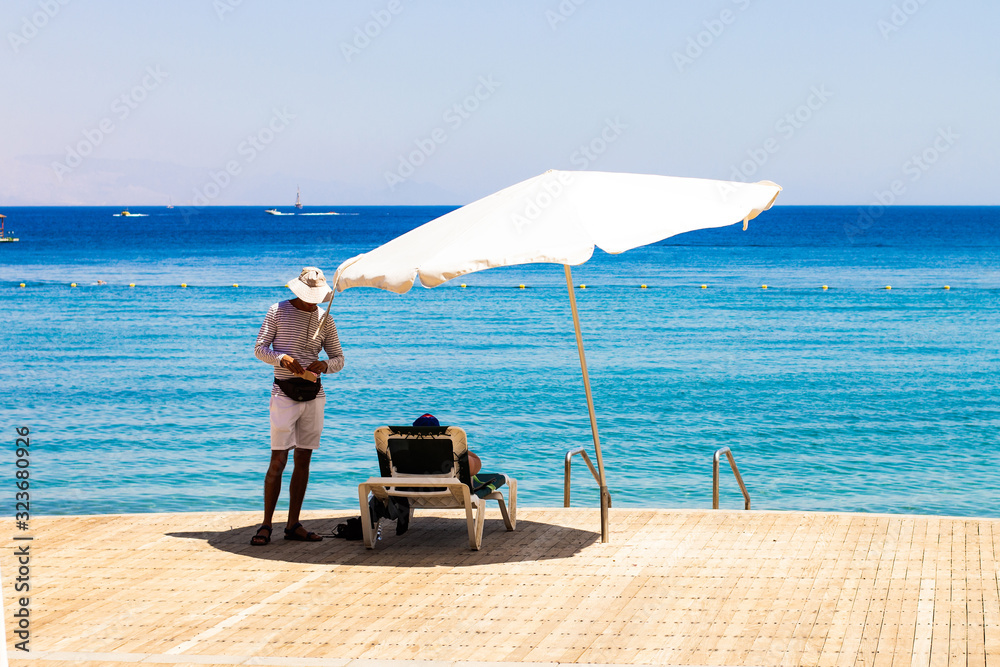 beach resort hotel waterfront space wooden deck floor Red sea beach ...