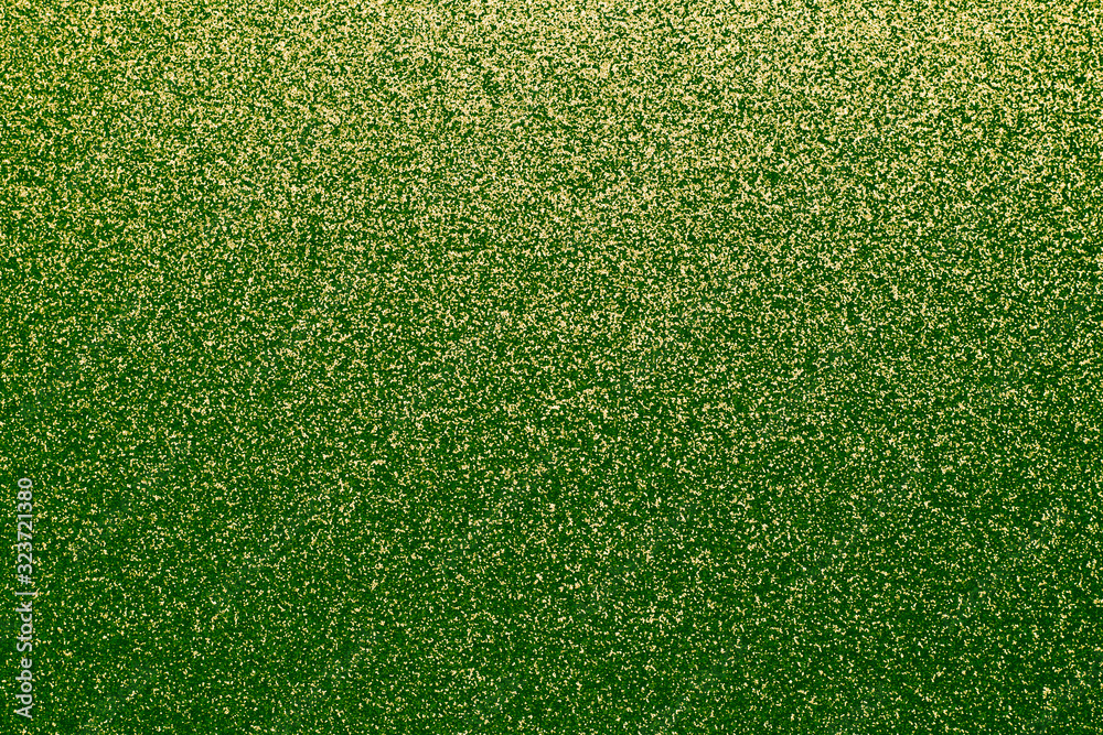 Glittering surface of green fiber. Sparkly material, shiny textile ...