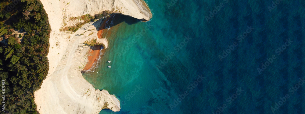 Aerial drone ultra wide photo of iconic white rock steep cliff volcanic ...