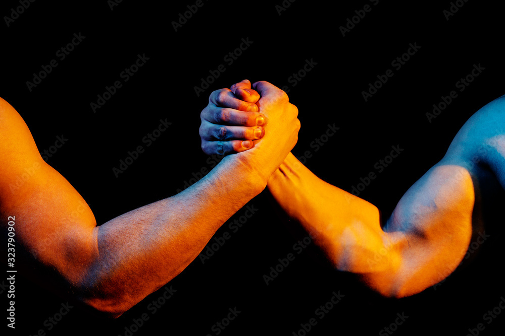 Rivalry, vs, challenge, strength comparison. Two men arm wrestling ...