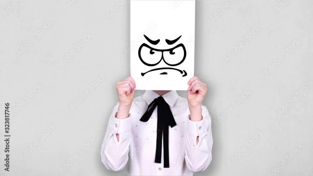 portrait, teenager holds white paper sheet with disappointed smiley ...