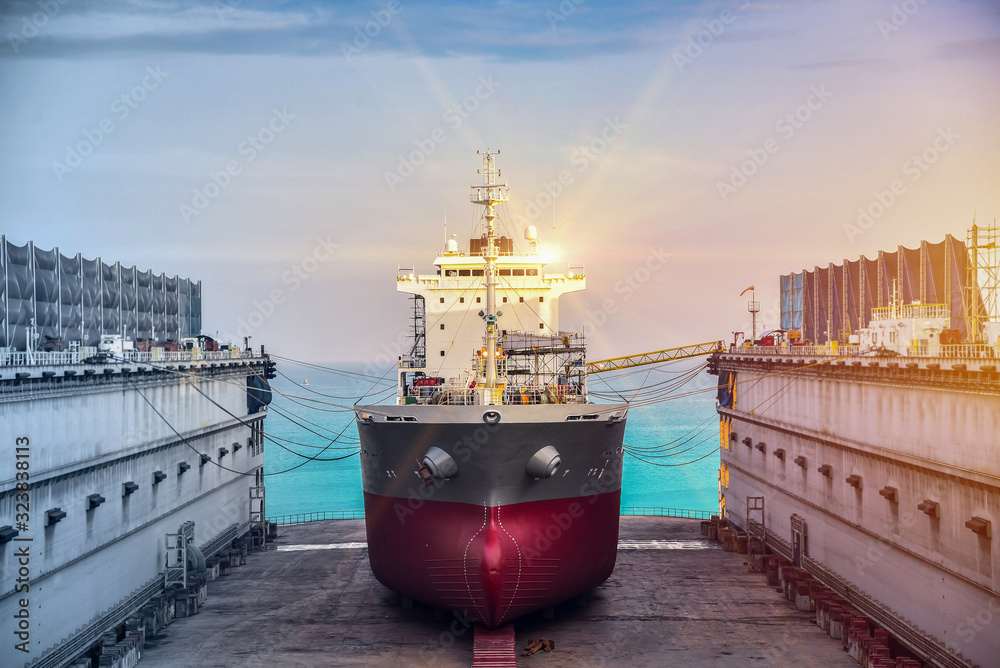 Top view of Cargo Ship moored at floating drydock Front View ship with ...
