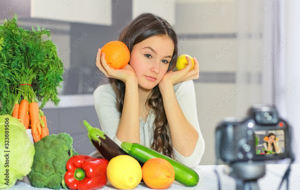 Teenage blogger explains to her followers how to eat healthy. Concept ...