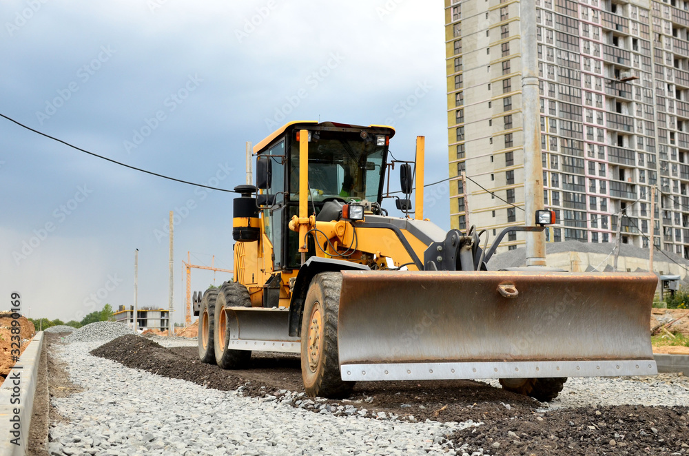 Сonstruction machine Motor Grader at a construction site level the ...