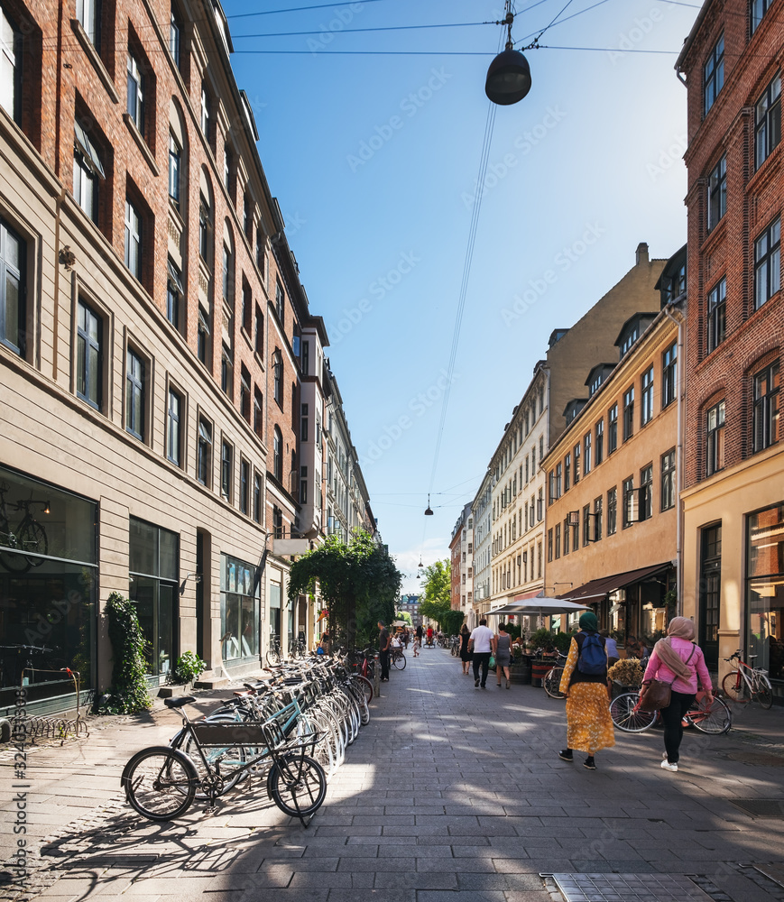 People walking in historic street of Old Town, Copenhagen, Denmark ...