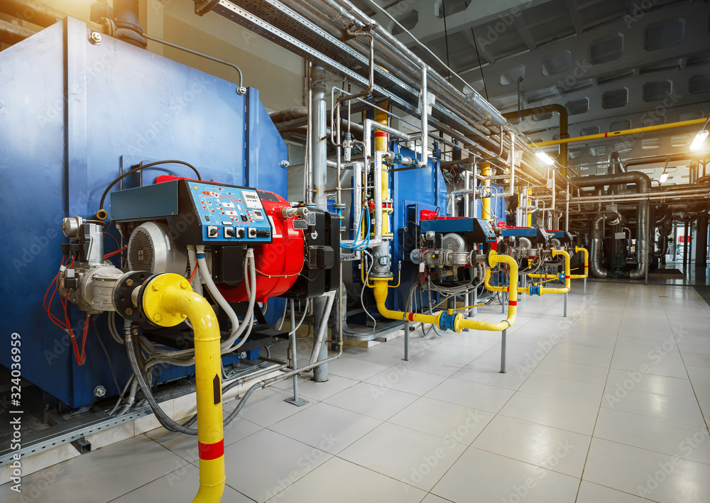 Modern industrial gas boiler room equiped for heating process. Heating ...