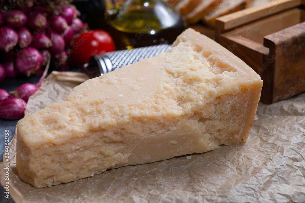 One piece of authentic Parmigiano-Reggiano or Parmesan Italian hard ...