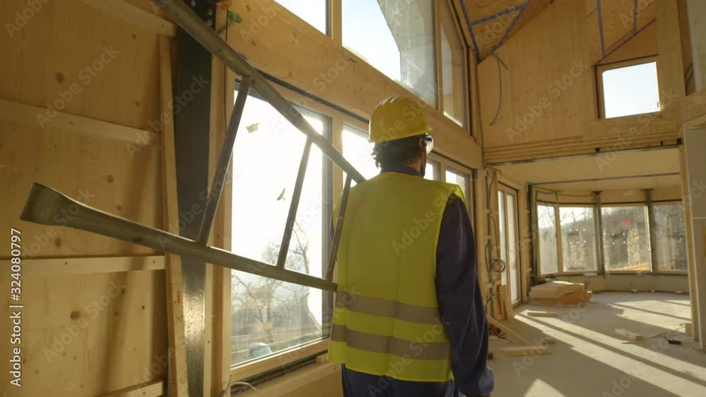 SLOW MOTION, CLOSE UP, LENS FLARE: Unrecognizable worker wearing blue ...
