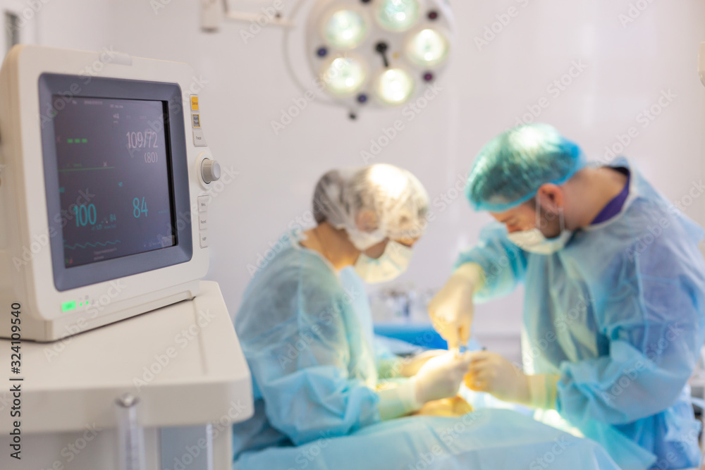 Hospital. Surgeon operates in the operating room. Monitoring of vital ...