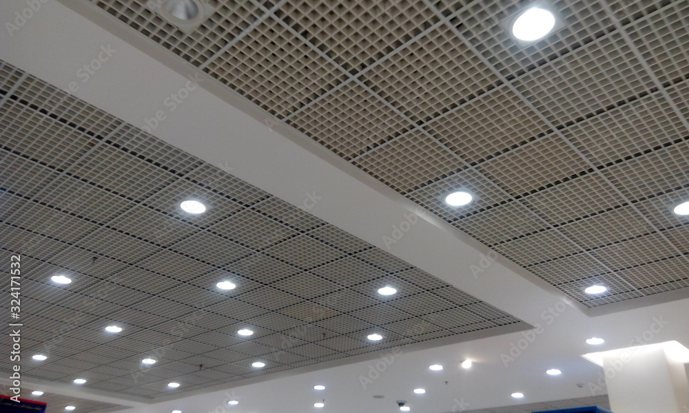 Grid ceiling and gypsum ceiling make an nice architectural interior ...