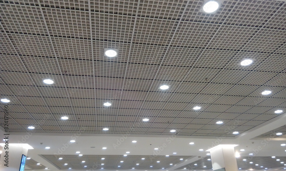 Grid ceiling and gypsum ceiling make an nice architectural interior ...