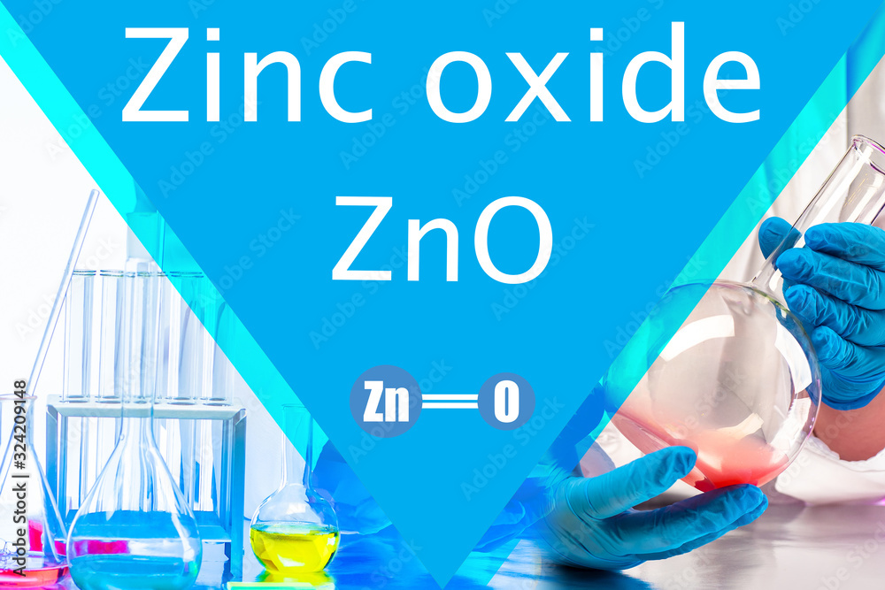 Zinc oxide. ZnO. Test tubes of different types stand on the table. Man ...