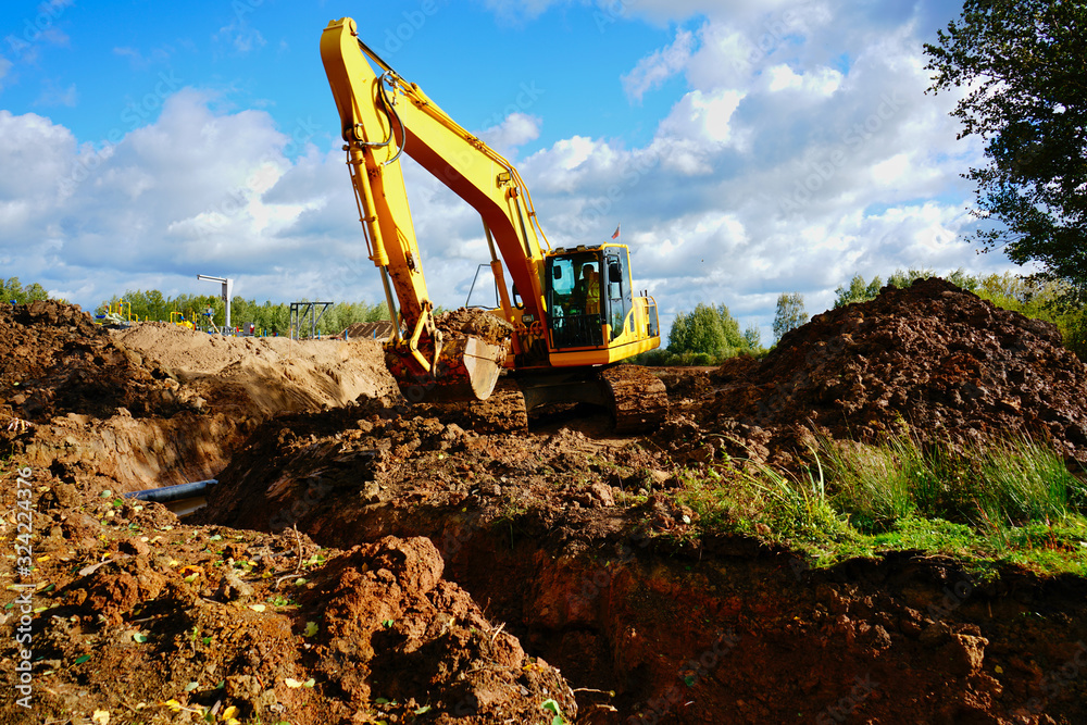 excavator digging ground construction Stock Photo | Adobe Stock