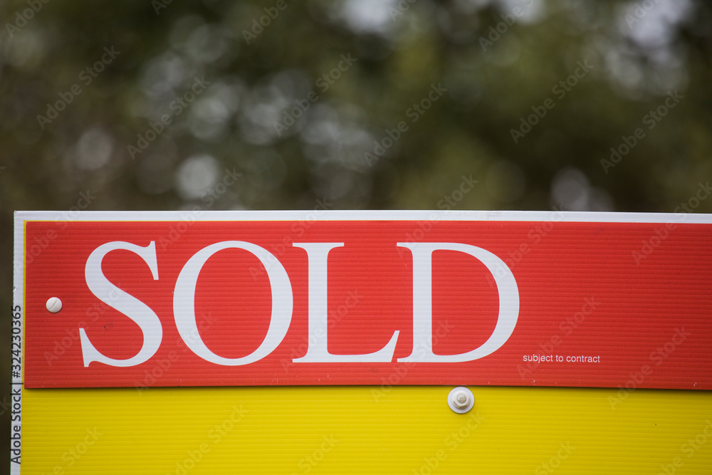 Red sold sign Unitd Kingdom UK England. Real estate investment ...