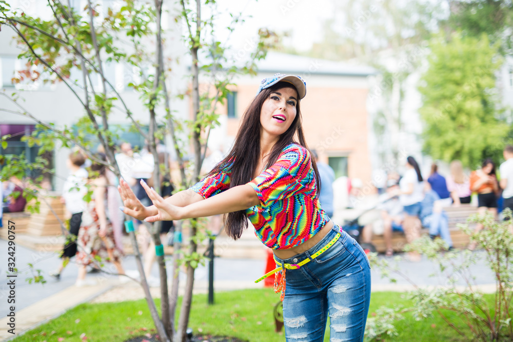 Street shaabi dance and urban dancer concept - Cheerful belly dancer ...