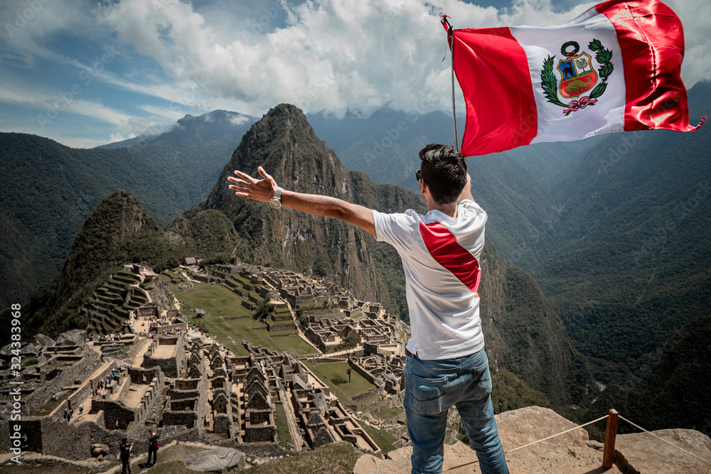 PERUVIAN FLAG FLAMING IN MACHU PICCHU Stock Photo | Adobe Stock
