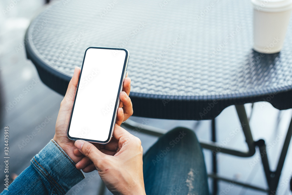 Mockup image blank white screen cell phone.man hand holding texting ...