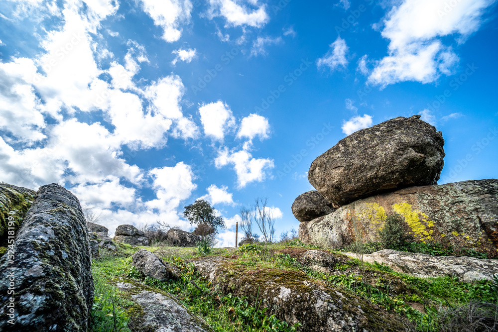 Bonito paisaje con rocas, nubes y naturaleza Stock Photo | Adobe Stock