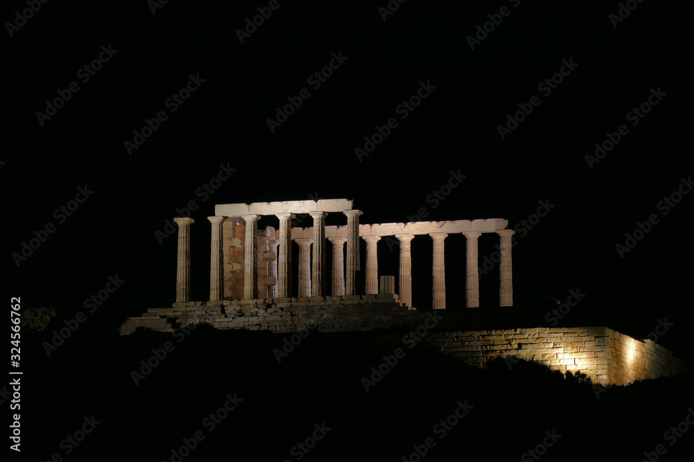 Panoramic night view of the remains of a Greek temple dedicated to ...