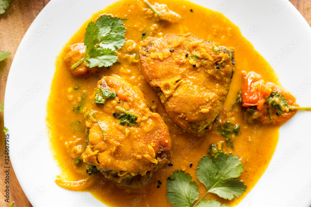 delicious indian fish curry is ready to serve Stock Photo | Adobe Stock