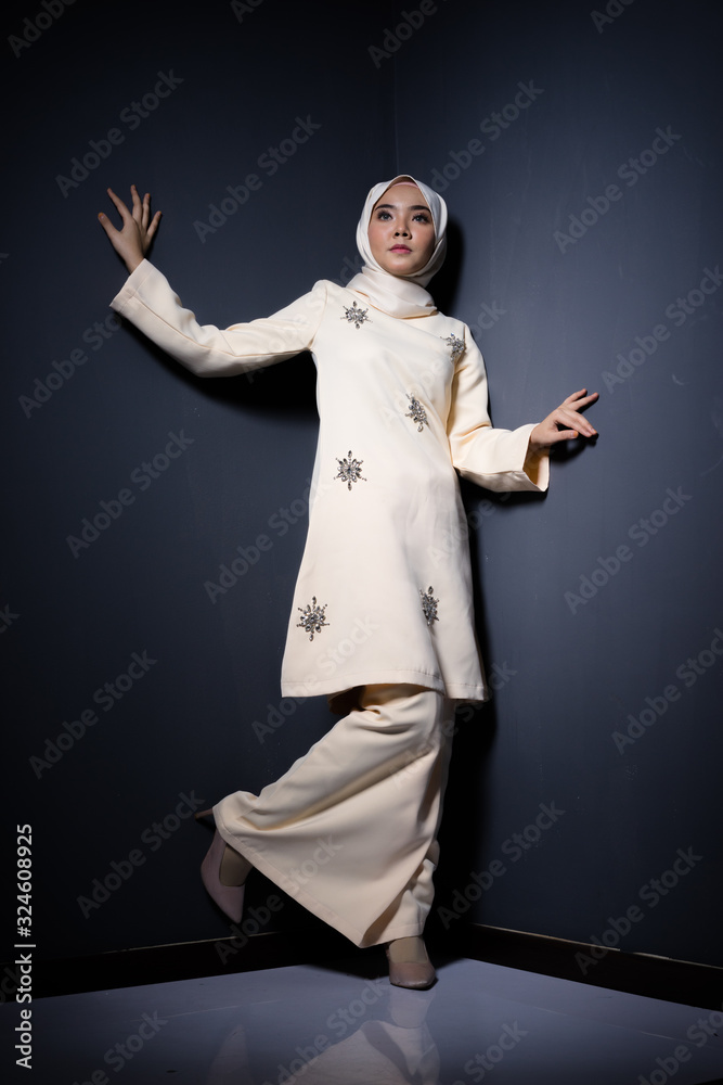 Hijab beauty and fashion editorial concept. A beautiful Muslim model in ...