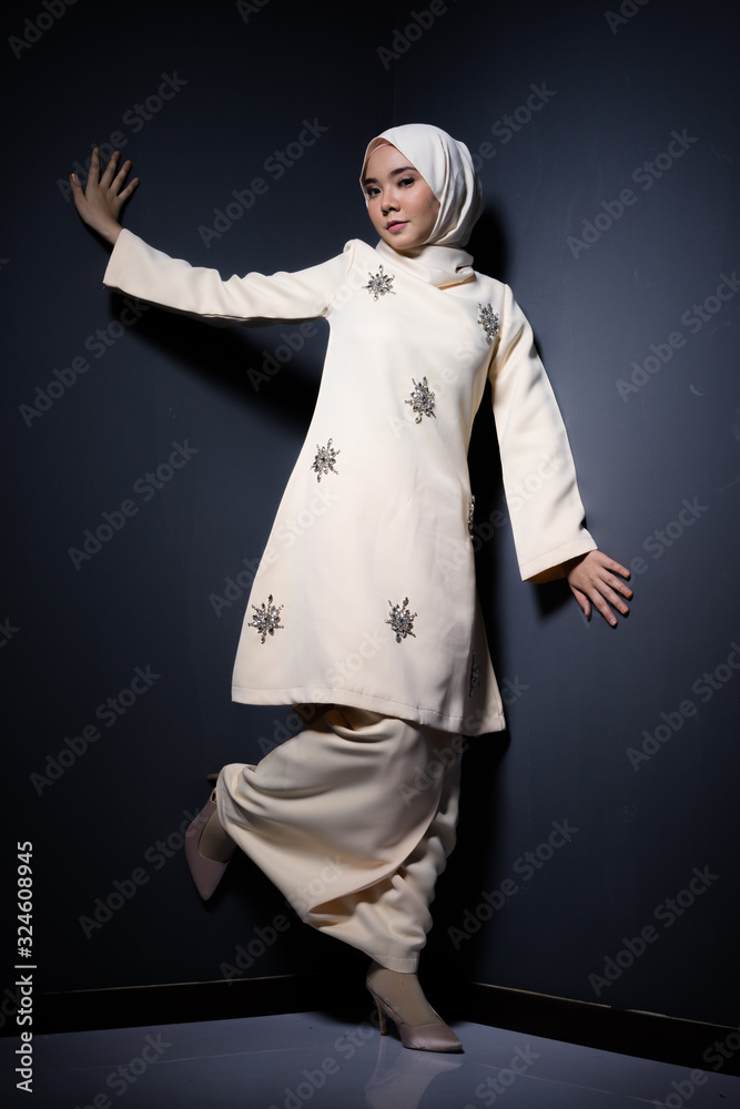Hijab beauty and fashion editorial concept. A beautiful Muslim model in ...