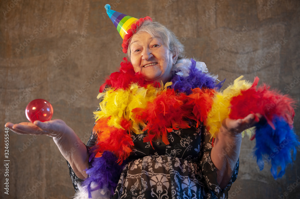 Extravagant LGBT old woman with gray hair and wrinkles in glasses ...