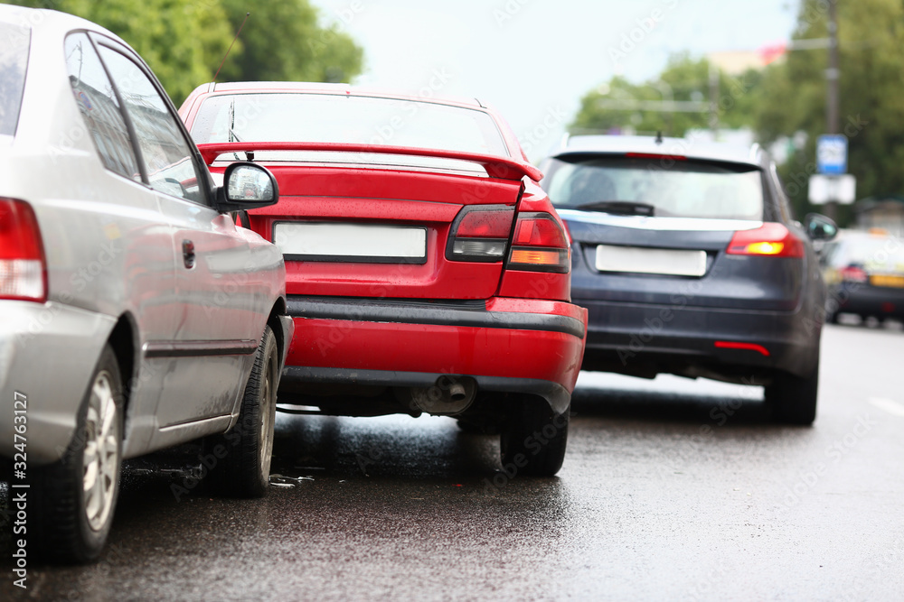 Accident of red and silver car after rain damage failure to keep ...