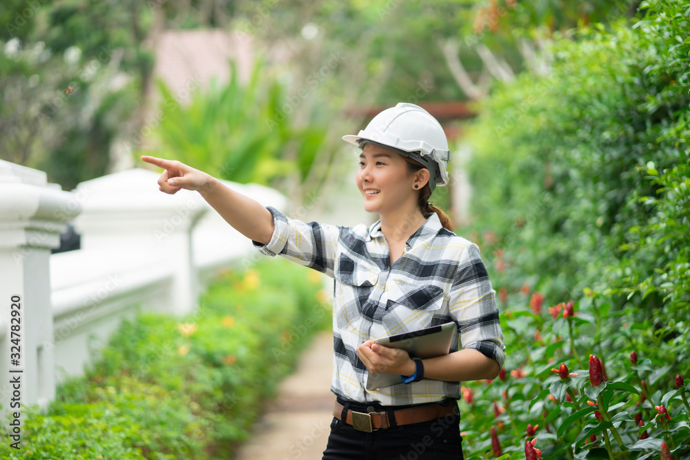 World environment day concept ,Thai Asian Female engineering working ...