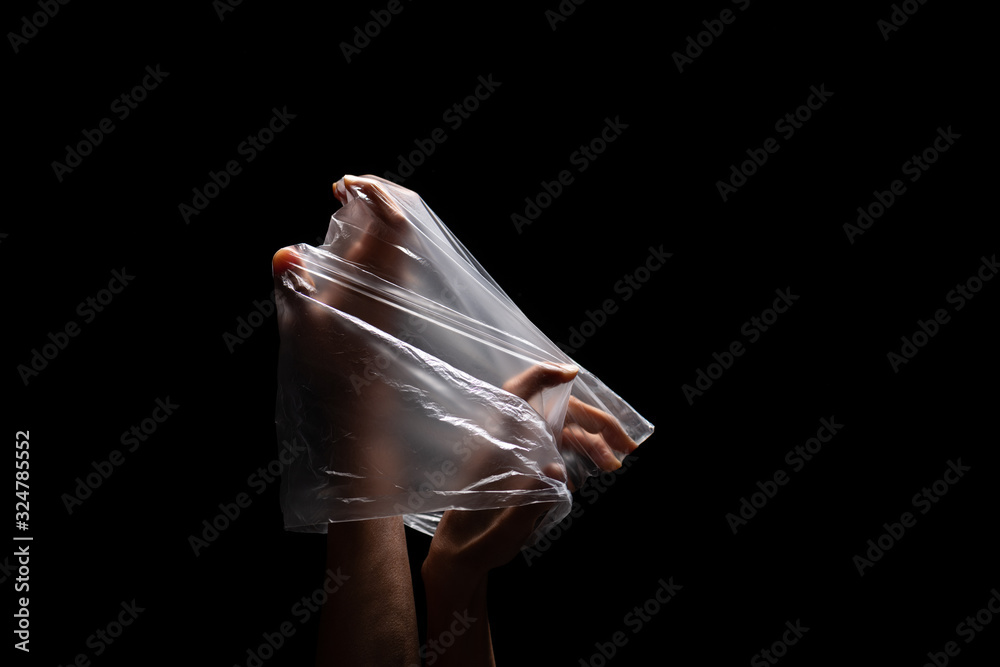 Ecological concept in Earth protection. Plastic bag refusal. Hands in ...
